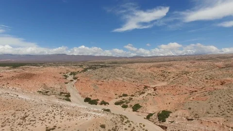 Aerial view of the arid desert in a sunn... | Stock Video | Pond5