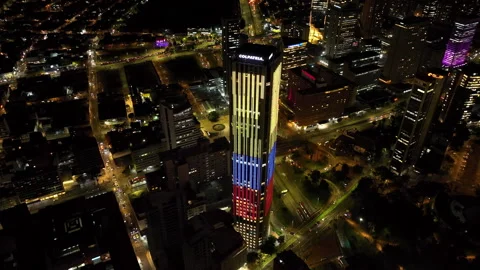 Aerial view around the illuminated Torre... | Stock Video | Pond5