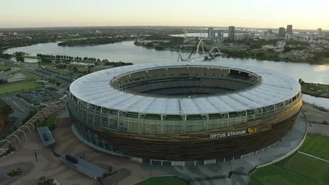 Aerial view around Optus Stadium at suns... | Stock Video | Pond5
