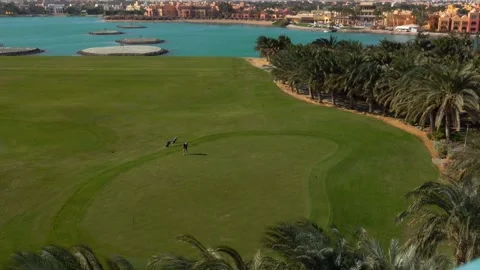 Aerial view on the artificial golf field... | Stock Video | Pond5