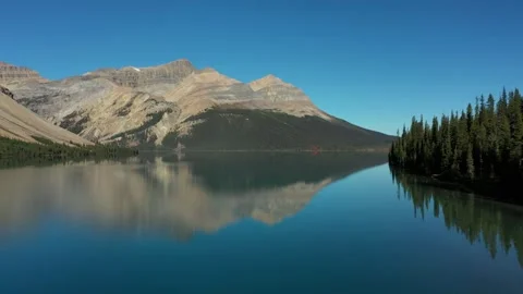 Aerial view of Bow Lake and the reflecti... | Stock Video | Pond5
