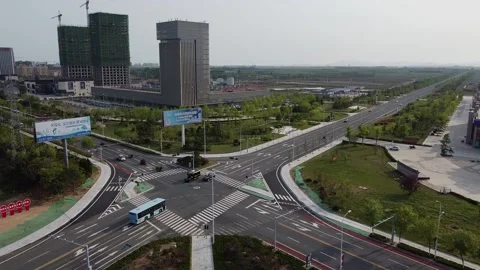 Aerial view of bus turning left at a hig... | Stock Video | Pond5