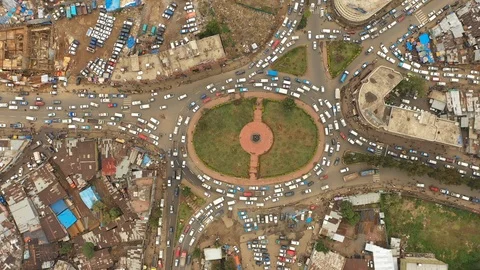 Aerial view busy roundabout intersection... | Stock Video | Pond5