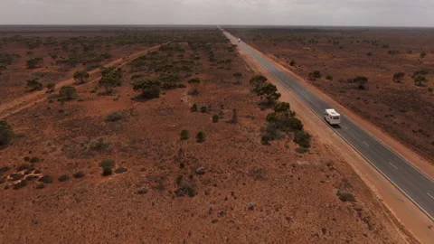 Aerial view of camper van on empty road ... | Stock Video | Pond5