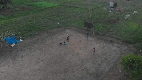 Aerial view of children playing a game o... | Stock Video | Pond5