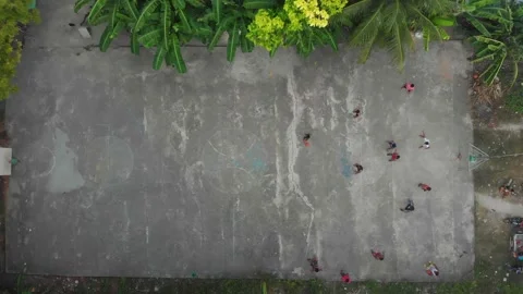 Aerial view of children playing a game o... | Stock Video | Pond5