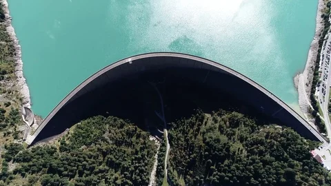 Aerial view of concrete arch gravity dam... | Stock Video | Pond5