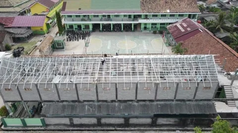 Aerial view of the construction of a sch... | Stock Video | Pond5