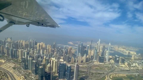 Aerial view of Dubai from plane, Palm Ju... | Stock Video | Pond5
