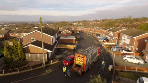 Aerial View of Dustmen putting recycling... | Stock Video | Pond5