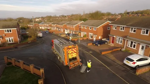 Aerial View of Dustmen putting recycling... | Stock Video | Pond5