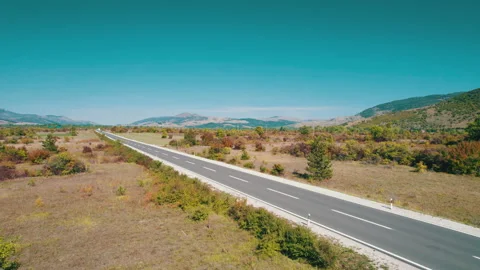 Aerial View Empty Asphalt Road on the Pl... | Stock Video | Pond5