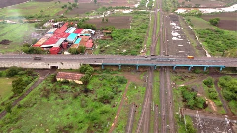 Aerial view of expressway bridge over ra... | Stock Video | Pond5
