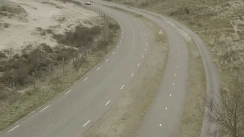 Aerial view of Ferrari 308 gti driving o... | Stock Video | Pond5
