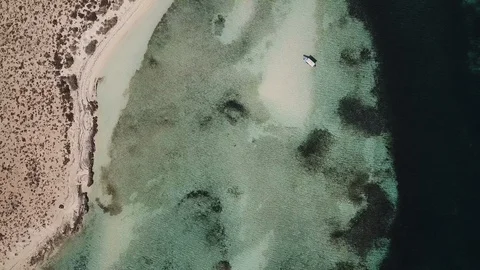 Aerial view fishing boat at tropical isl... | Stock Video | Pond5