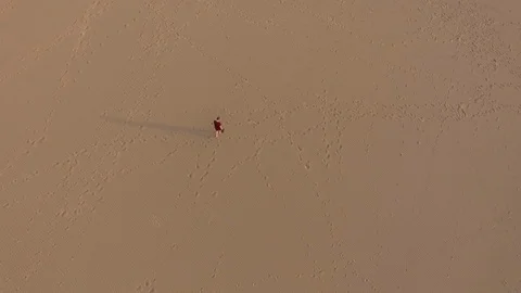 Aerial view flying backwards of a young ... | Stock Video | Pond5