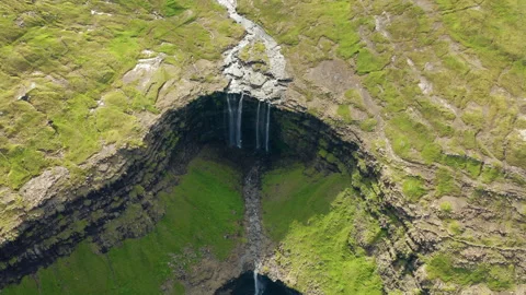Aerial view of the Fossa waterfall at su... | Stock Video | Pond5