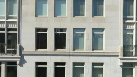Aerial view in front of windows of a tal... | Stock Video | Pond5