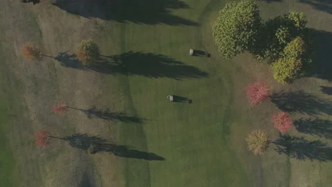 Aerial View of a Golf Cart Driving Throu... | Stock Video | Pond5