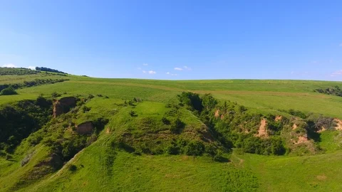 Aerial view of green natural hill field ... | Stock Video | Pond5