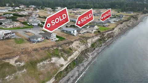 Aerial view of homes with "SOLD" signs a... | Stock Video | Pond5