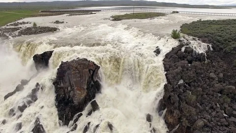 Aerial view of huge overflow waterfall a... | Stock Video | Pond5