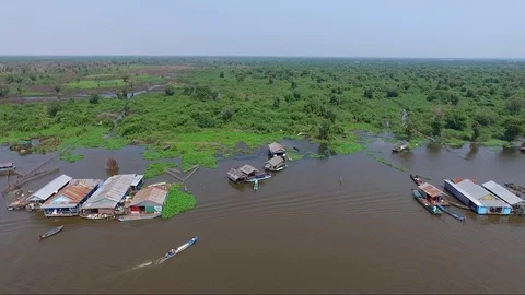 Aerial view of huts built over the mekon... | Stock Video | Pond5