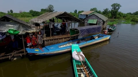 Aerial view of huts built over the mekon... | Stock Video | Pond5