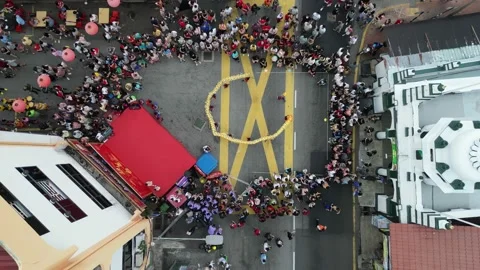 Aerial view look down dragon dance at st... | Stock Video | Pond5