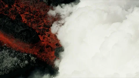 Aerial view magma pouring into ocean ste... | Stock Video | Pond5