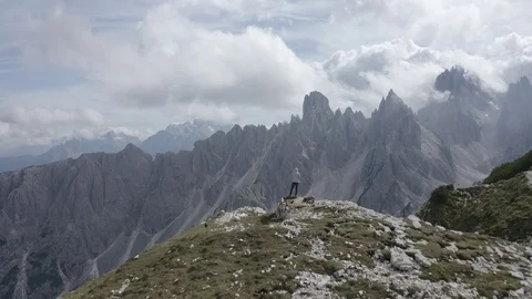 Aerial View Man Alone on Top of the Moun... | Stock Video | Pond5