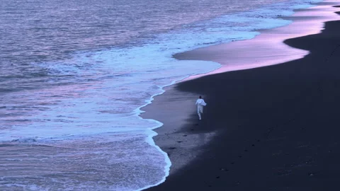 Aerial view of man in white running fast... | Stock Video | Pond5