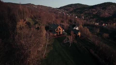 Aerial view of modern cabin house in for... | Stock Video | Pond5