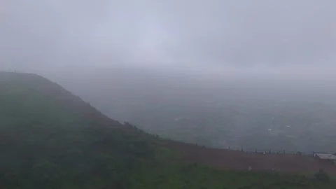 Aerial view of mountains and hills at mo... | Stock Video | Pond5