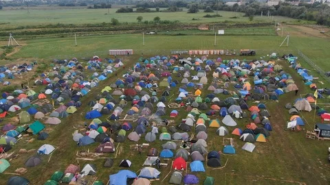 Aerial View of Multi-Colored Tents Pitch... | Stock Video | Pond5