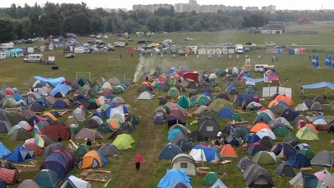 Aerial View of Multi-Colored Tents Pitch... | Stock Video | Pond5