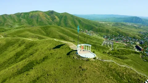 Aerial View o flag mountains and the obs... | Stock Video | Pond5