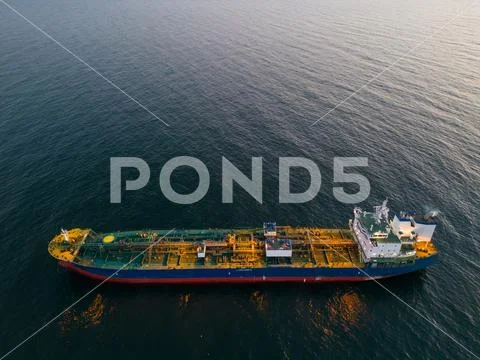 Aerial view oil ship tanker carrier oil on the sea at sunset ~ Hi Res ...