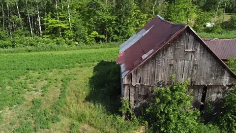Aerial view of an old wood farm house | Stock Video | Pond5