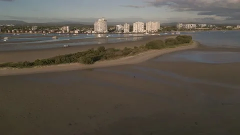 Aerial view over Curlew Island on the Br... | Stock Video | Pond5