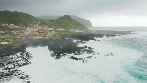 Aerial view of pebbled beach washed with... | Stock Video | Pond5