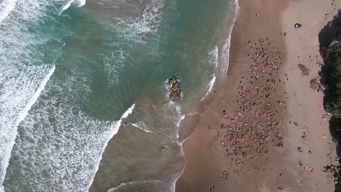 Aerial view of people bathing in sand ho... | Stock Video | Pond5