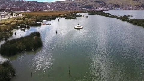 Aerial view of Peruvian city Puno, lake ... | Stock Video | Pond5