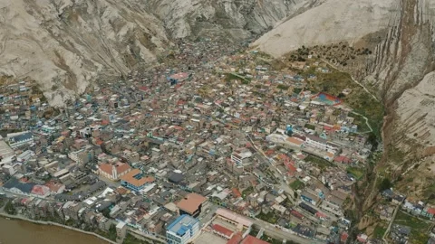 Aerial view pueblo inside the Andes Moun... | Stock Video | Pond5