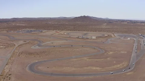 Aerial view of a racetrack in the desert... | Stock Video | Pond5
