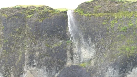 Aerial view of a remote waterfall along ... | Stock Video | Pond5