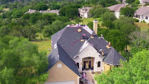 Aerial view roofing crew remove old shin... | Stock Video | Pond5
