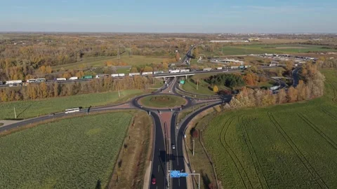 Aerial view of a roundabout connecting s... | Stock Video | Pond5