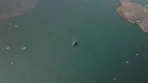Aerial view of a sailing boat along the ... | Stock Video | Pond5