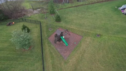 Aerial view of a slide in an empty playg... | Stock Video | Pond5